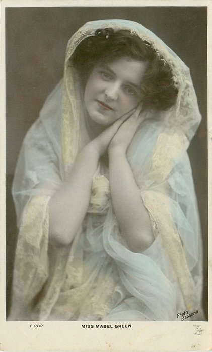 MISS MABEL GREEN seated facing & looking front, both hands on her left cheek - TuckDB Postcards